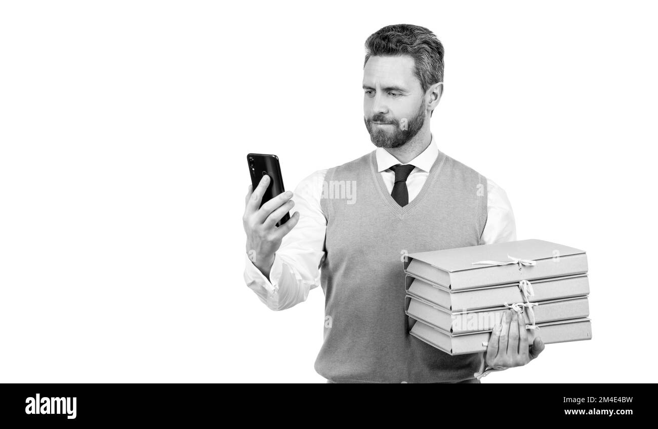 mature businessman hold folder heap with documents looking at ...