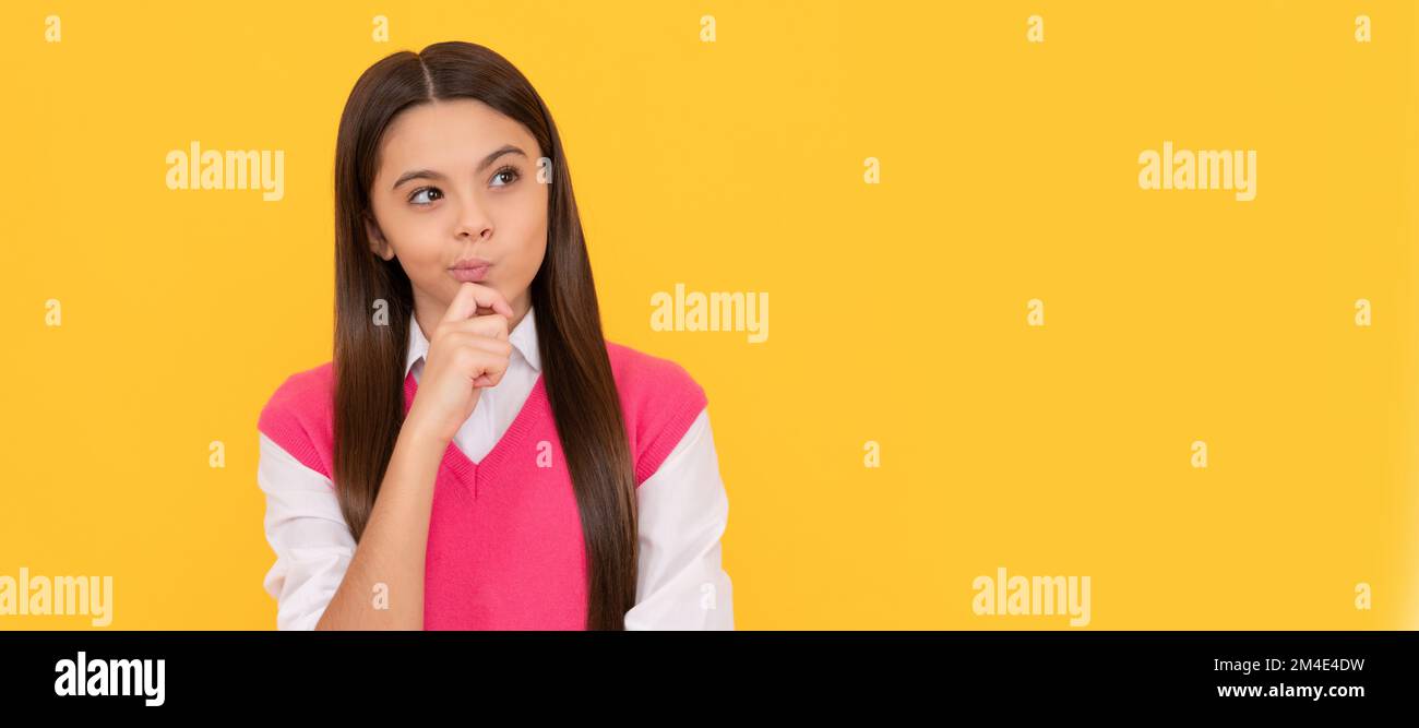 tween and youth. casual fashion. thinking teen girl on yellow ...