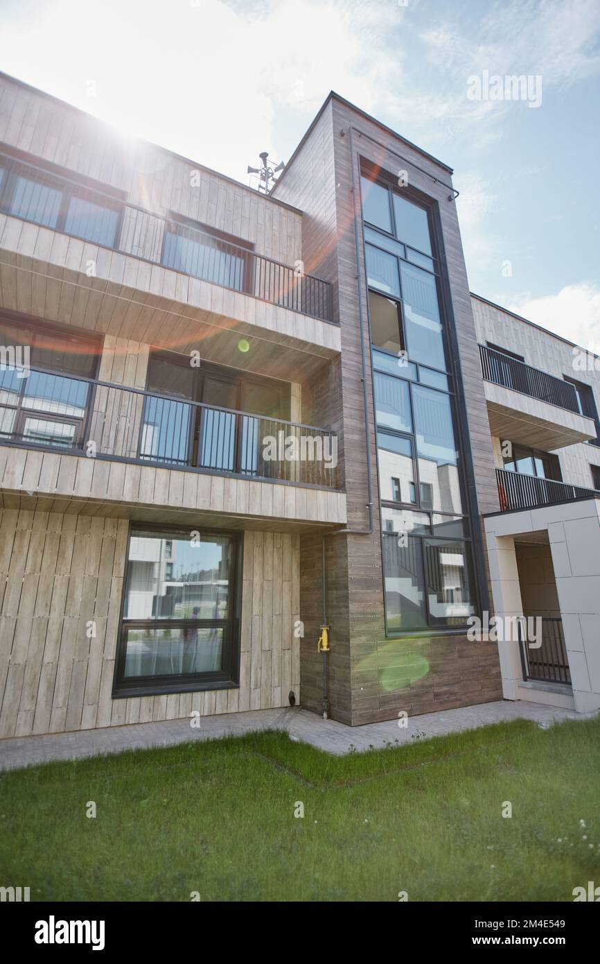 Wide angle shot of modern apartment building with lens flare Stock ...