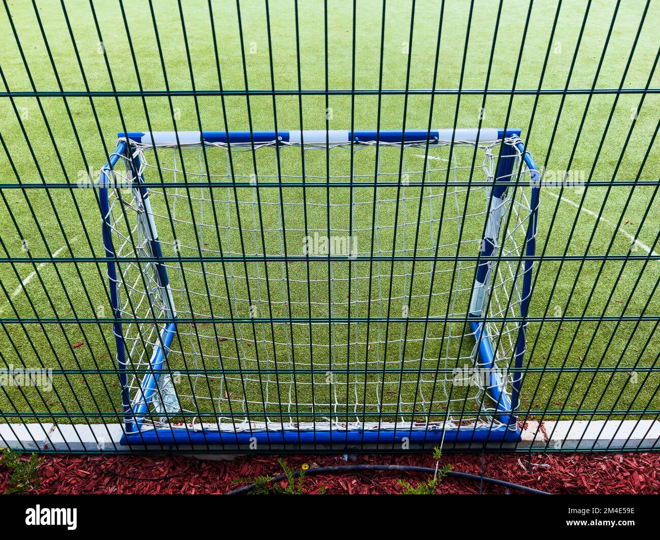 A small football net in a field Stock Photo - Alamy