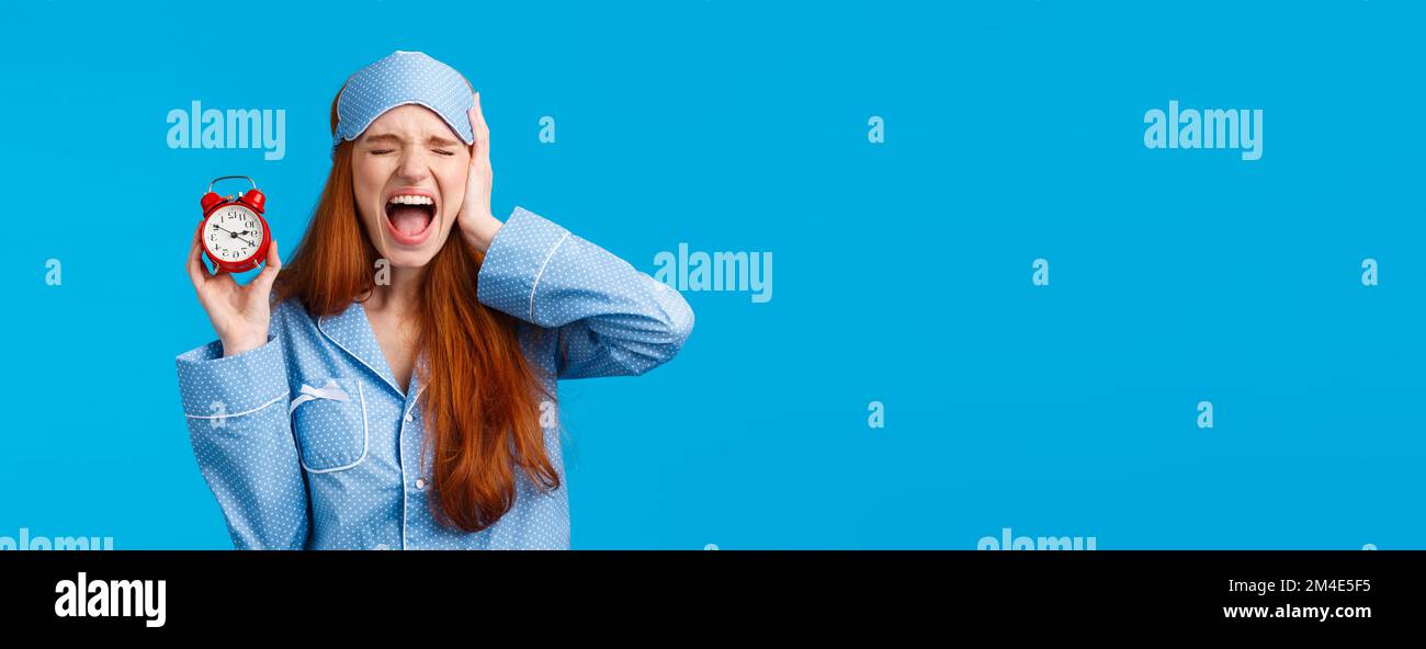 Upset and distressed screaming redhead lovely girl feeling bothered and ...