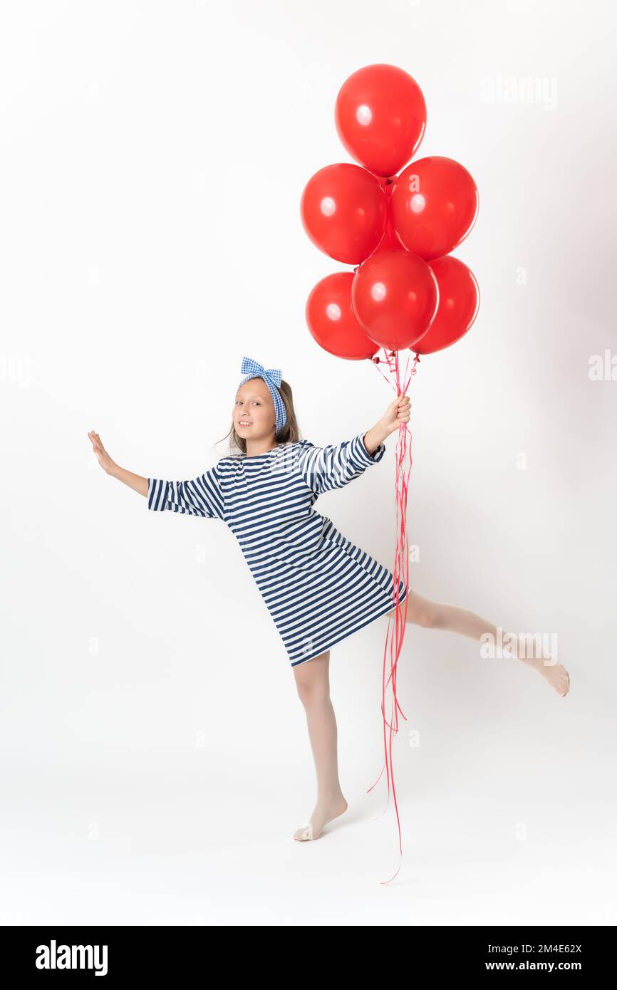Holding balloons on one leg hi-res stock photography and images - Alamy