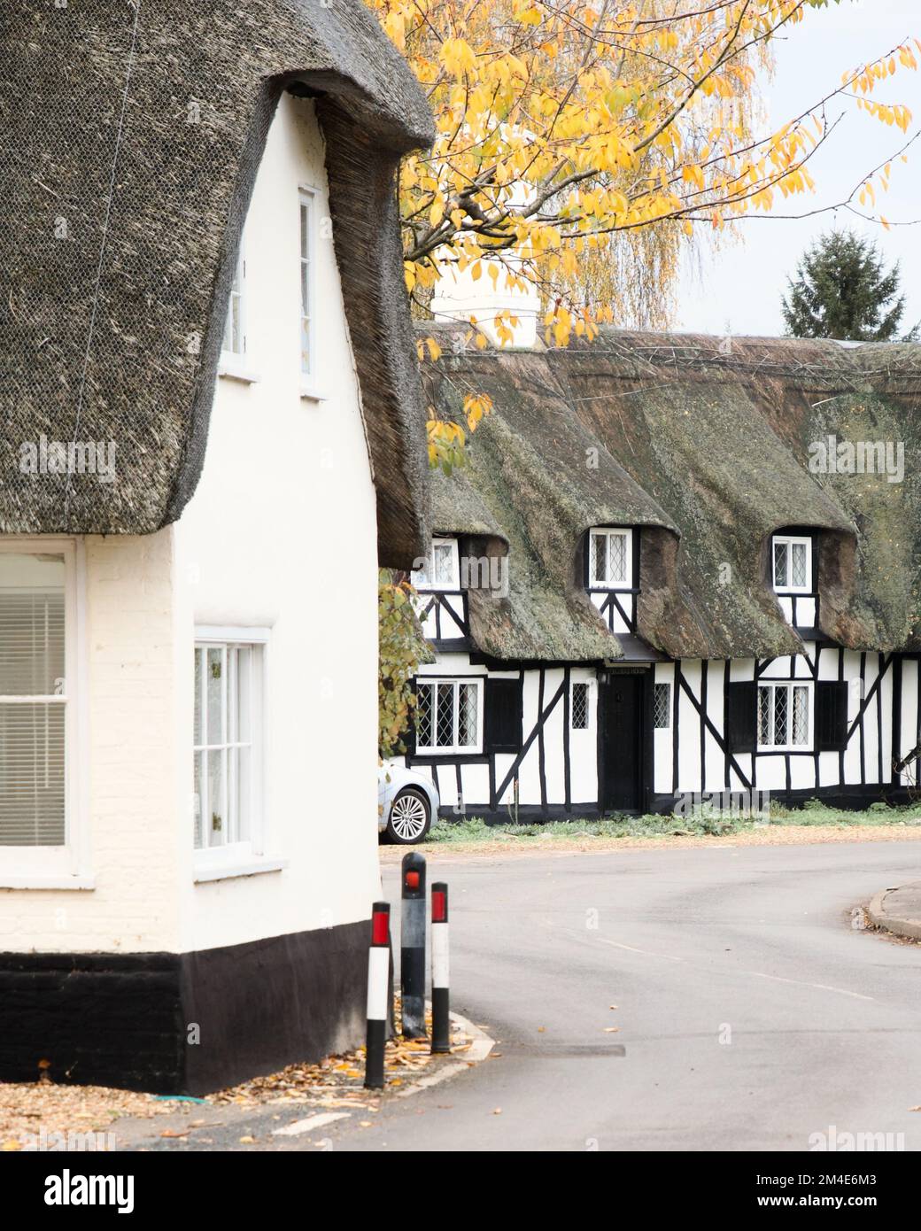 A vertical shot of beautiful thatched cottage in Hemingford Grey ...