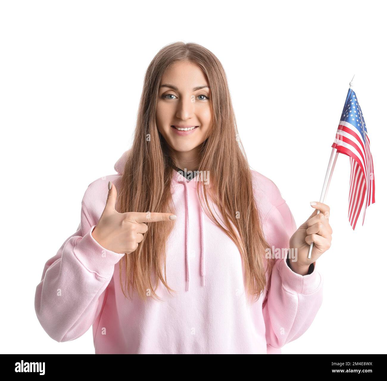 Beautiful woman pointing at USA flags on white background Stock Photo ...