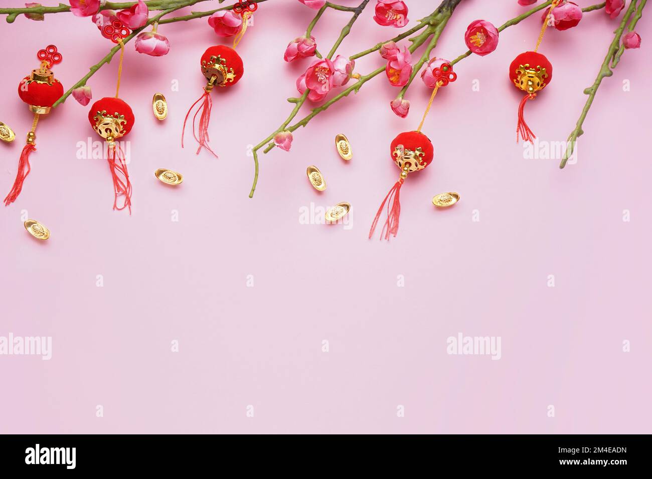 Beautiful sakura and Chinese symbols on pink background. New Year ...