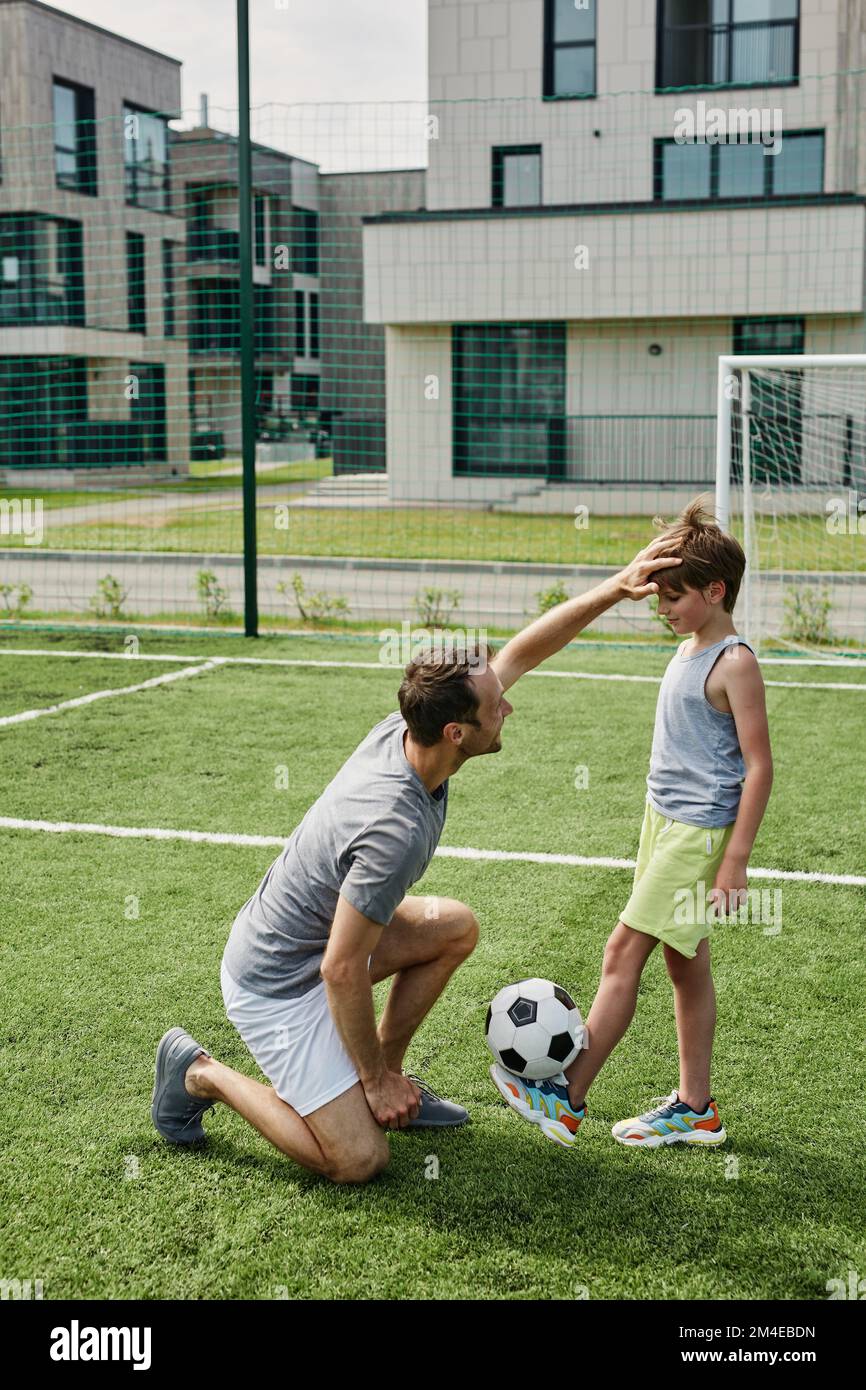 Football together hi-res stock photography and images - Alamy