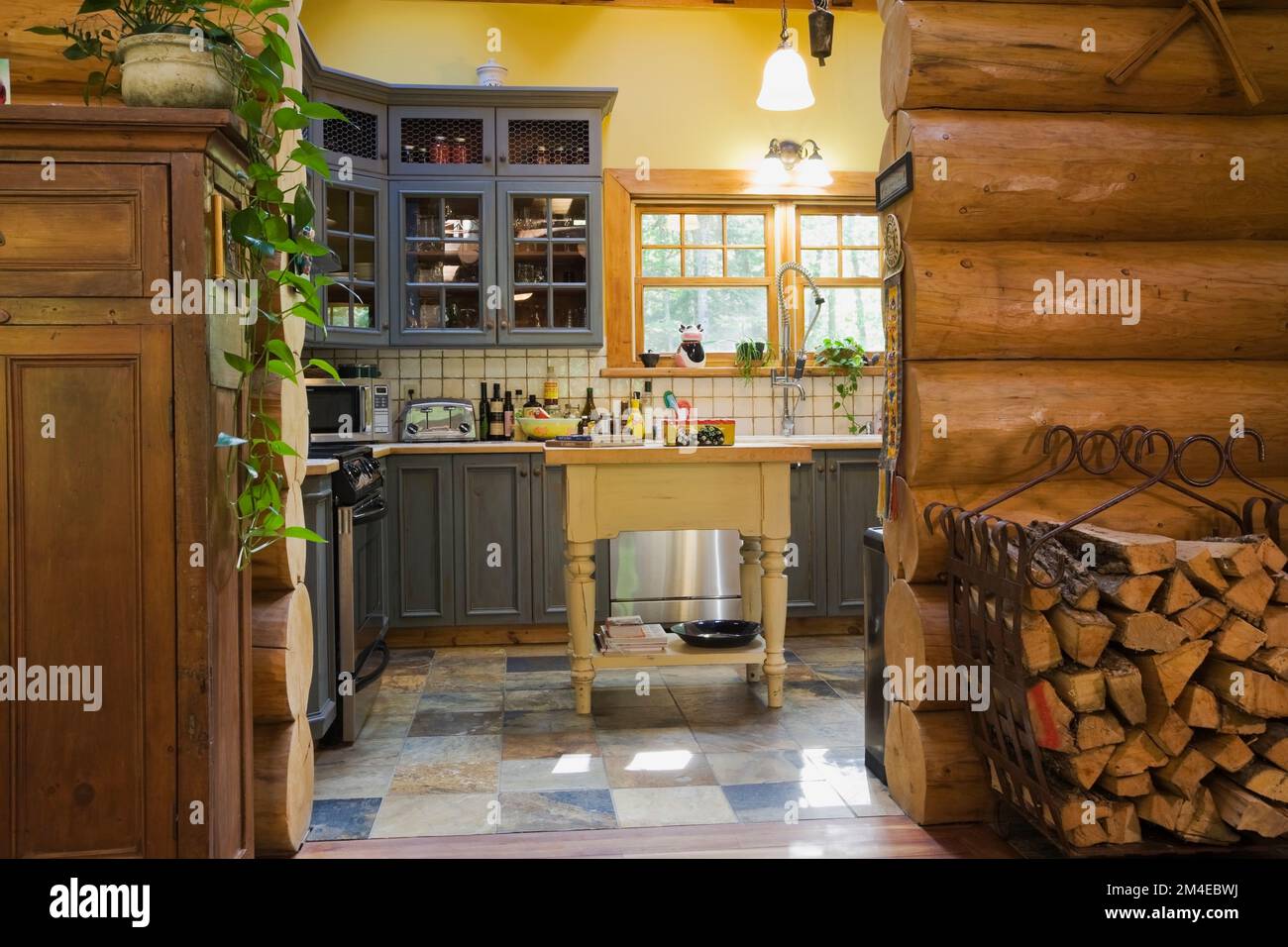 Country style kitchen inside 2003 built cottage style log home Stock ...