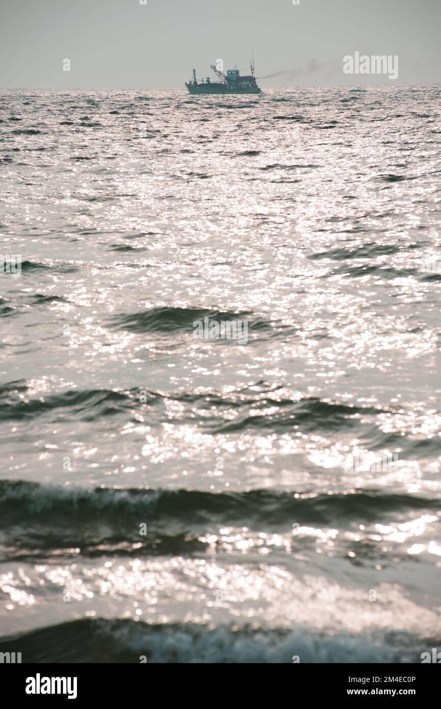 Sea at light reflecting Stock Photo - Alamy