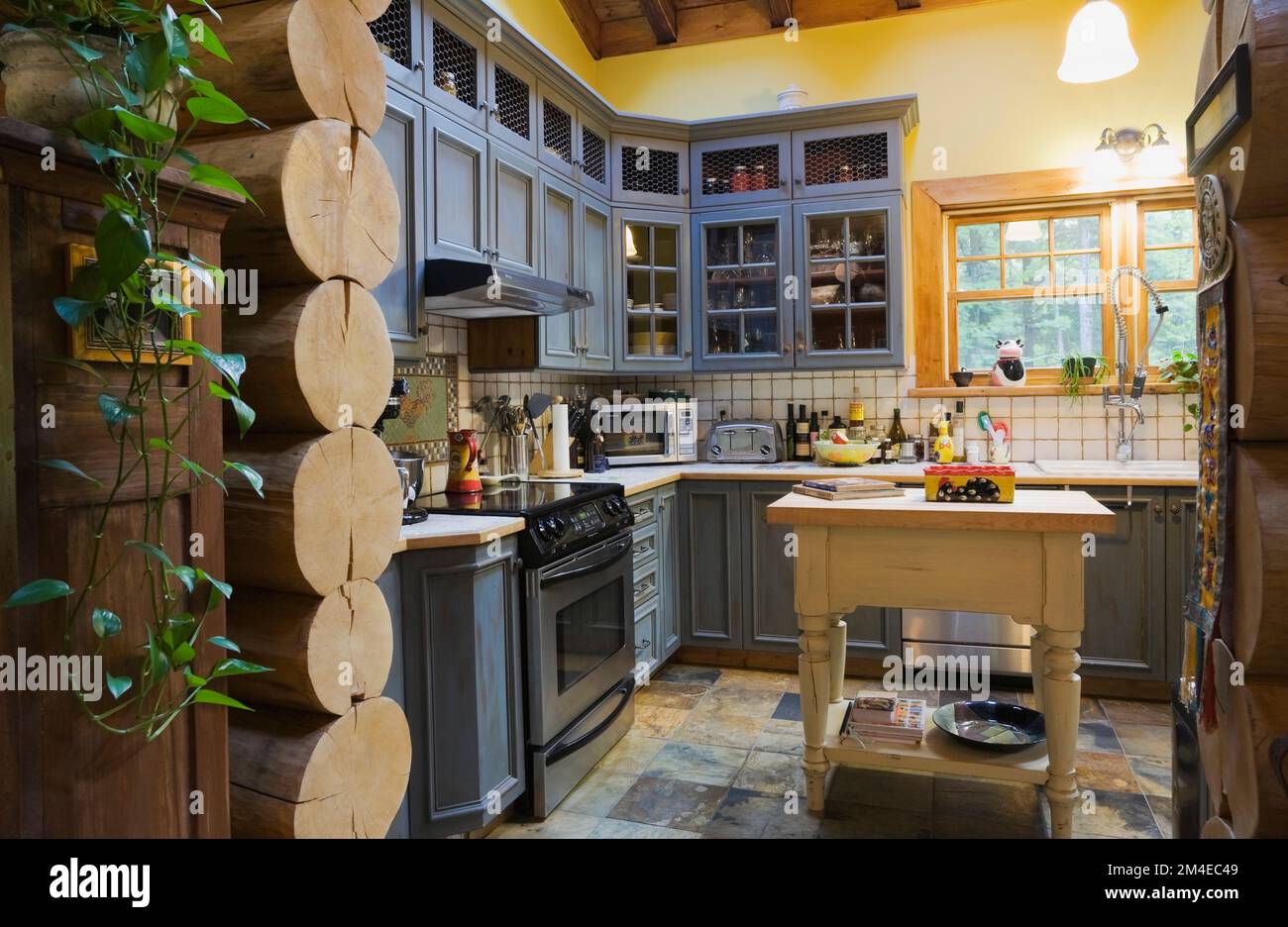 Country style kitchen inside 2003 built cottage style log home Stock ...