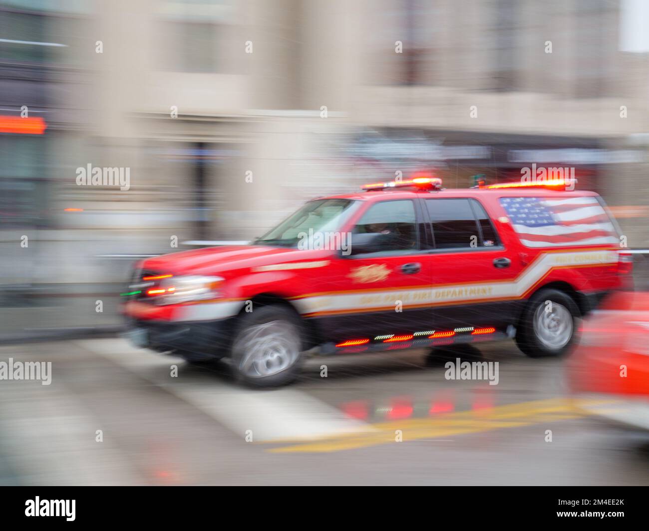 Fire department SUV rushing to emergency. Intentionally blurred Stock ...