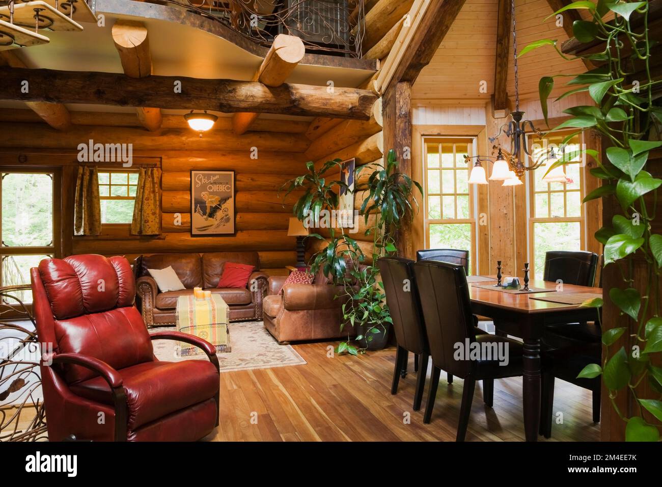 Living room with red leather armchair and dining table inside 2003 ...