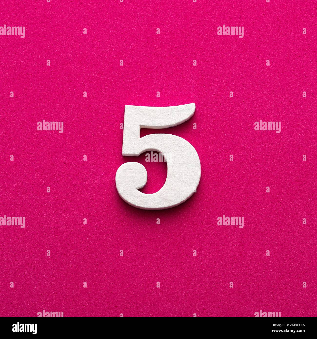 Number five - white number in wood on rhodamine red background Stock ...