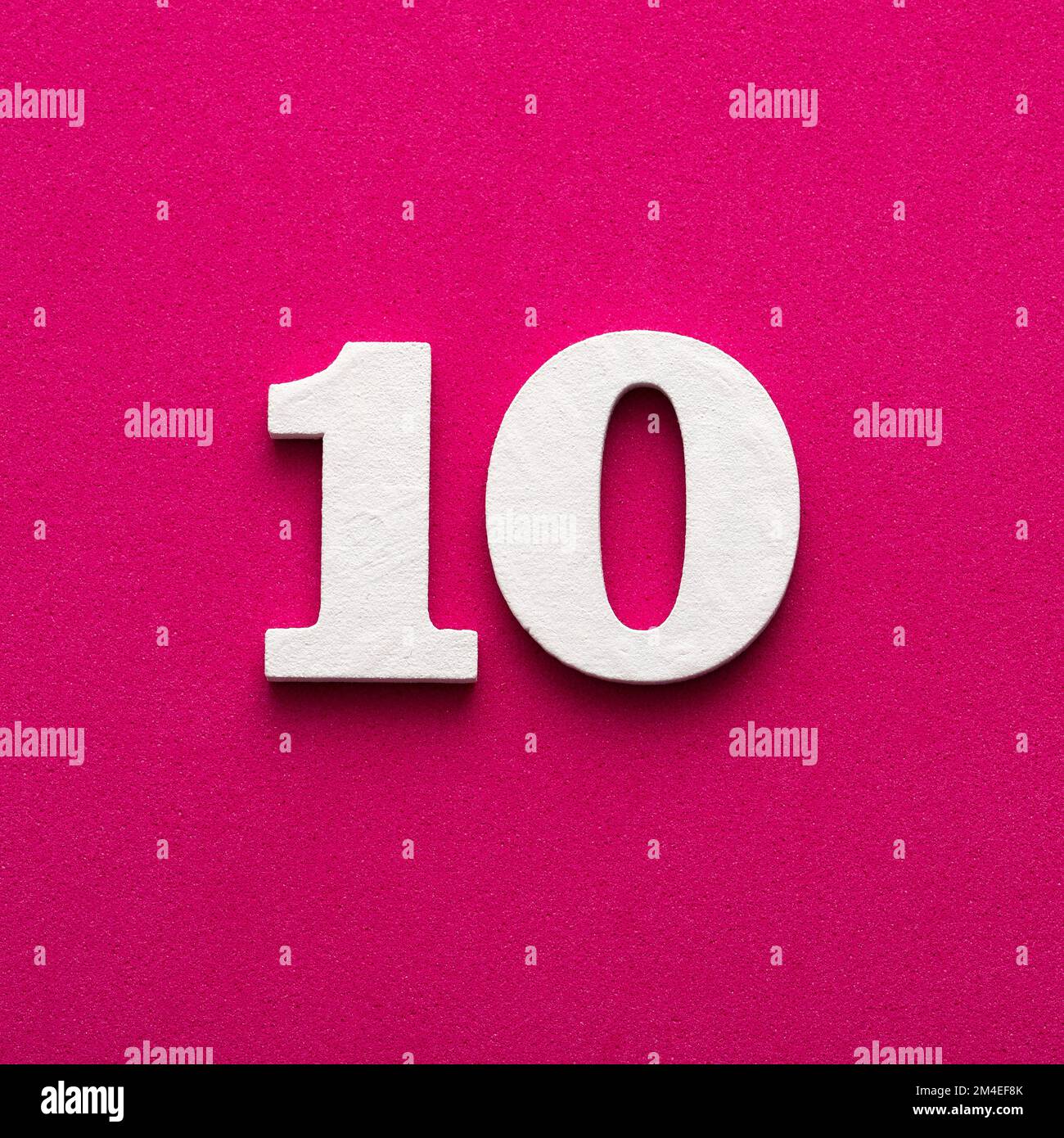 Number 10 - White wooden number on rhodamine red background Stock Photo ...