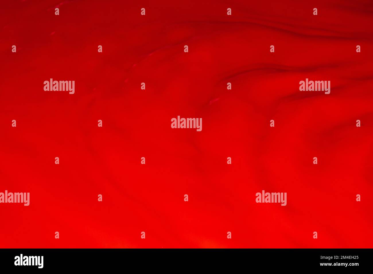 Red liquid, waves, fluidity Stock Photo - Alamy