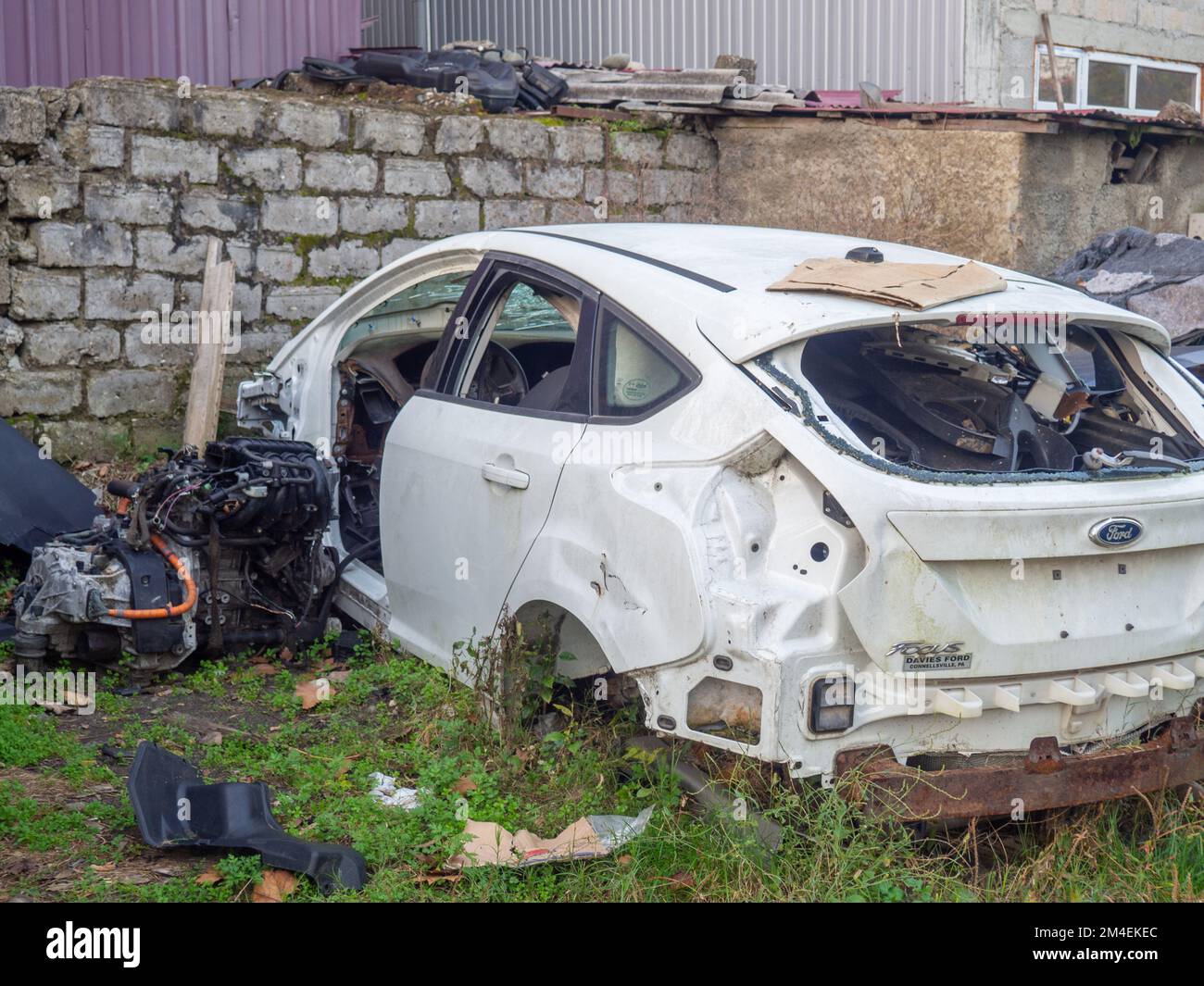 Broken cars near the car workshop. Cars in the landfill. A pile of scrap metal. Former transport ...