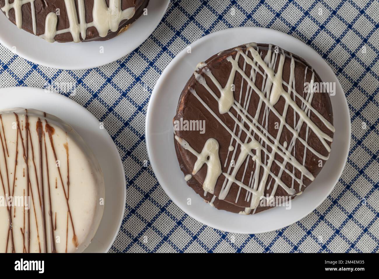 Top view of chocolate alfajores, typical candy in Argentina, on a ...
