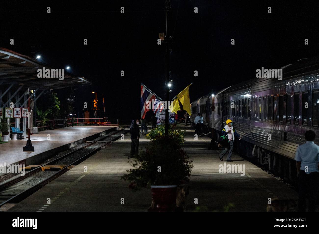 A traveler boards in Special Express 14 in the middle of the night. The ...