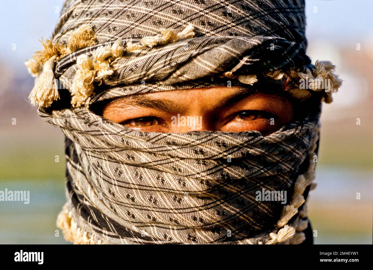Labor have to cover their face because of strong wind Stock Photo - Alamy