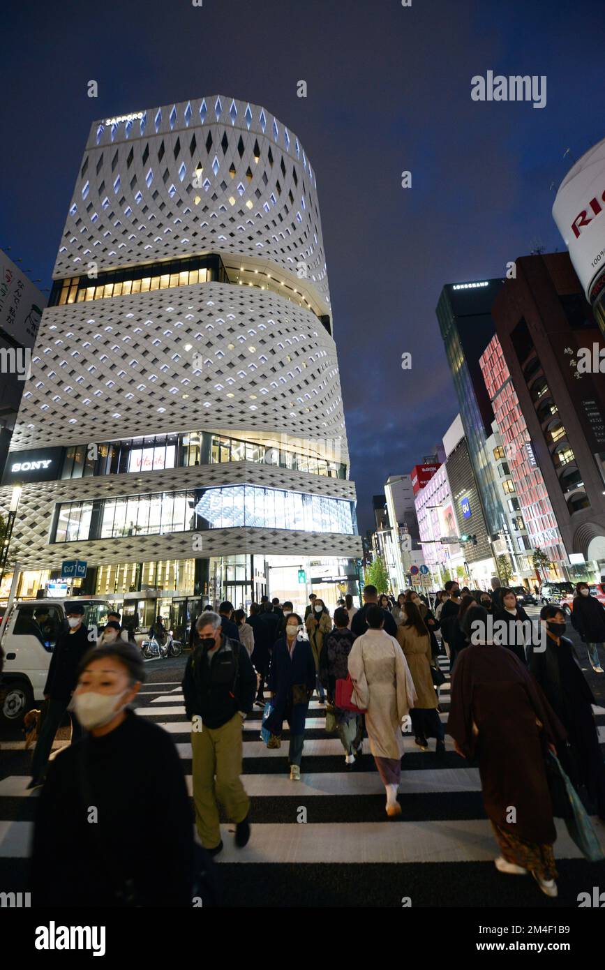 Ginza Place is a landmark building with a unique lattice façade ...