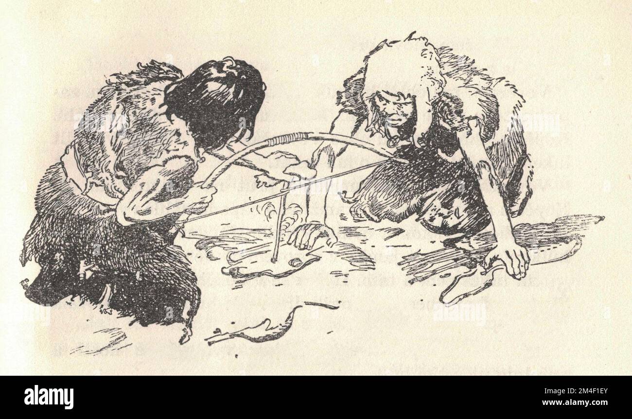Prehistoric people try to start a fire. Old black and white ...