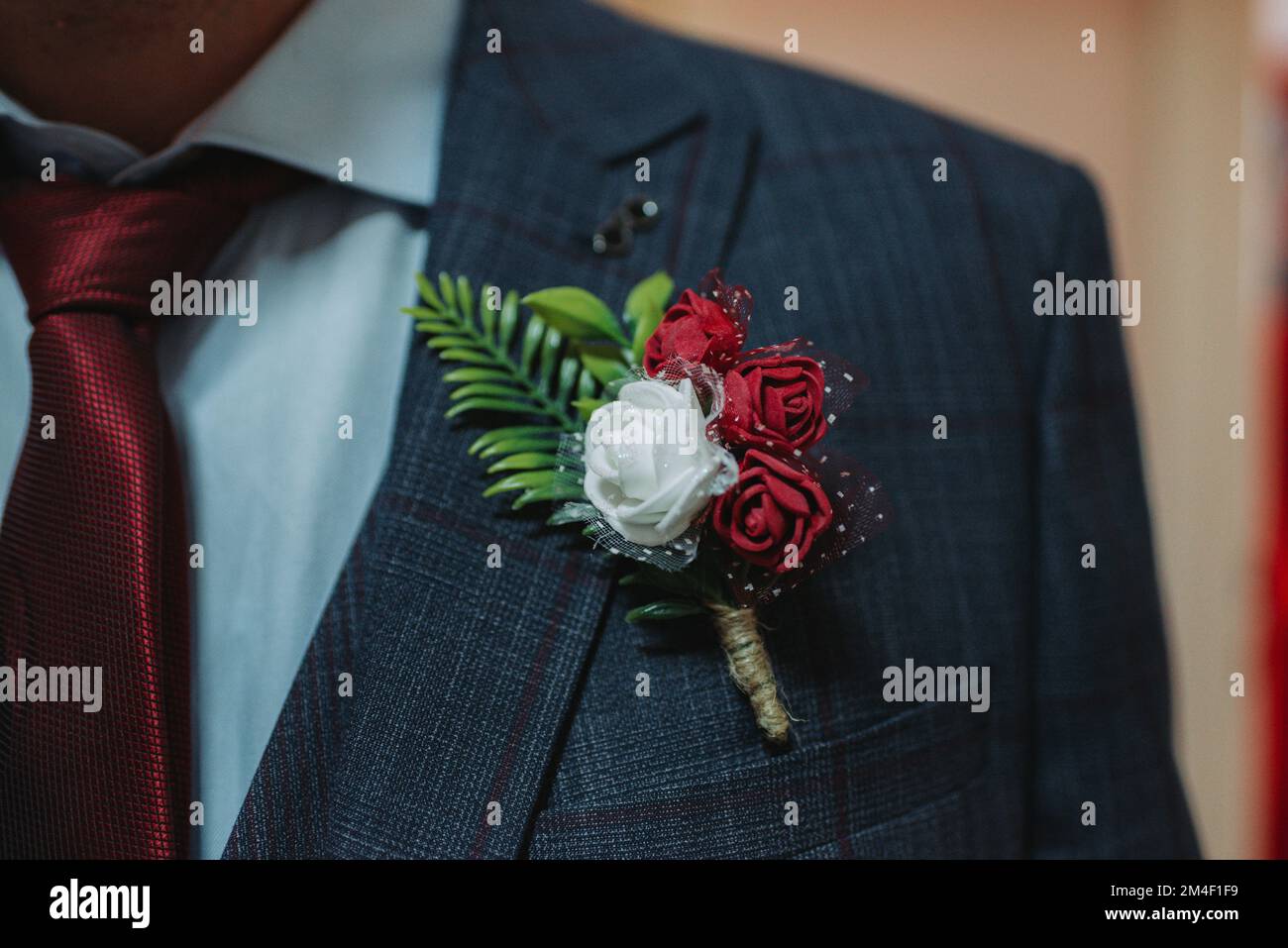 A closeup of a beautiful Buttonhole on a suit of an elegant man Stock ...