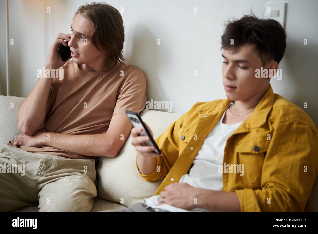 Friends spending time talking on phone and texting instead of talking ...