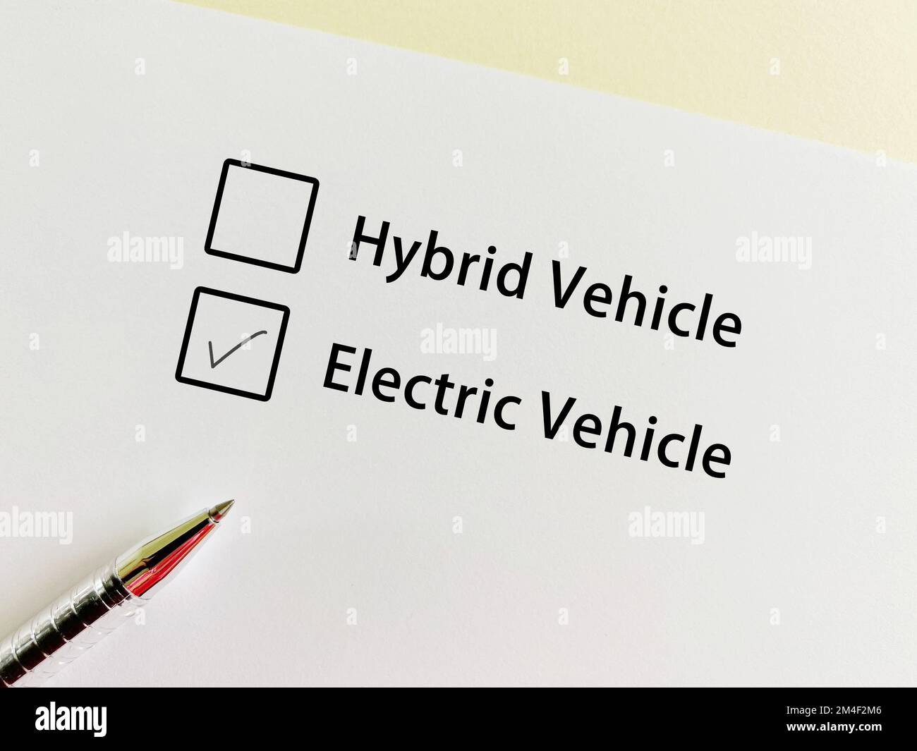 A person is answering question about vehicles. He chooses electric ...