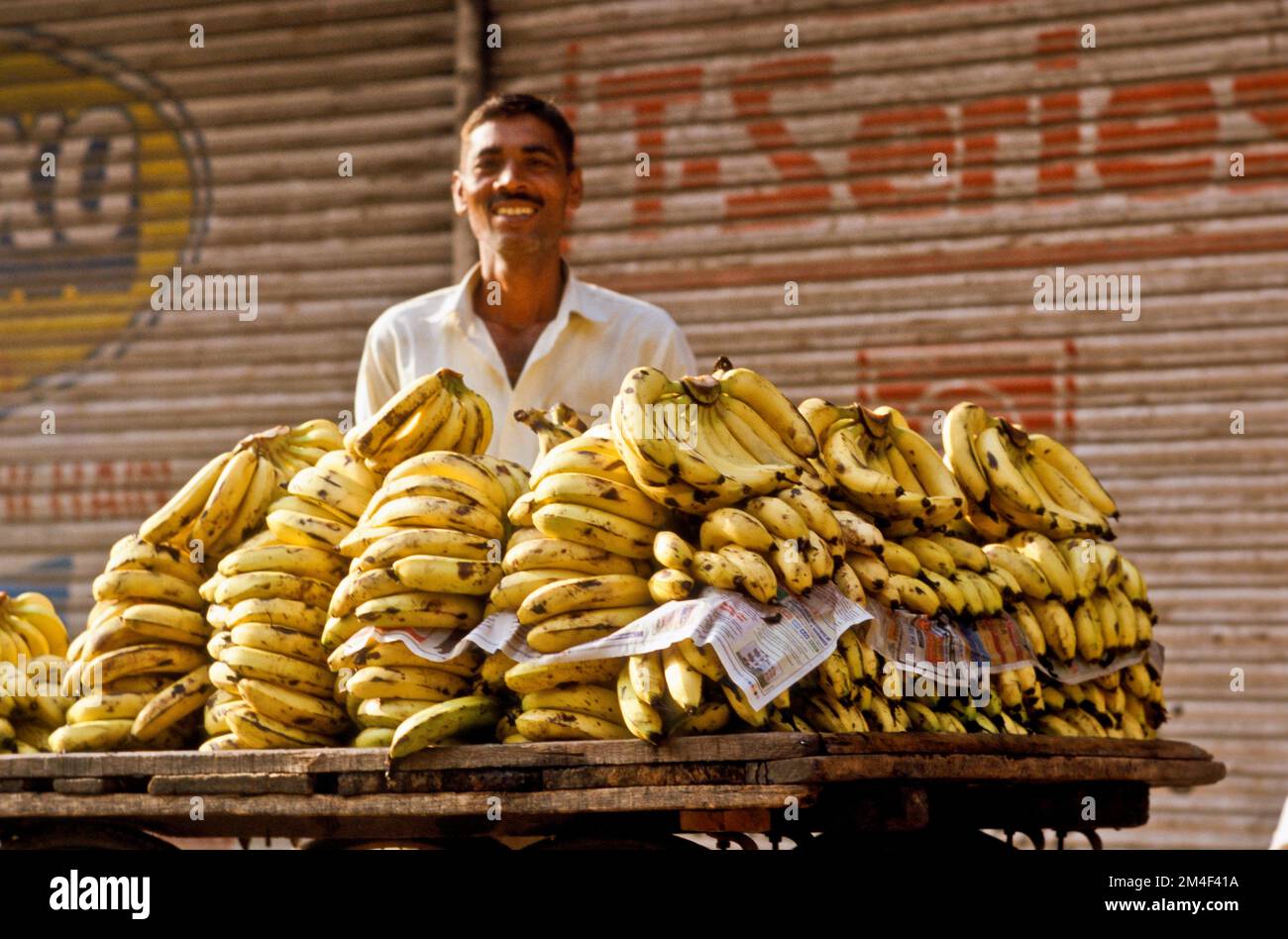 Bananas sold on the street Stock Photo - Alamy