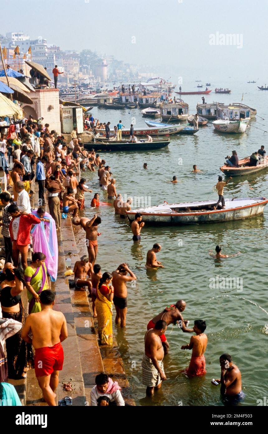 The ghats in Varanasi are busy with pilgrims every morning Stock Photo ...