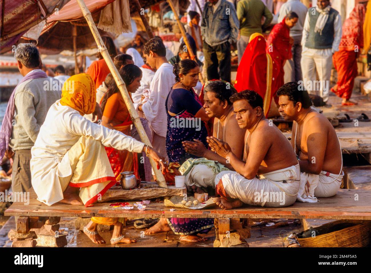 Priests offering ceremonies and blessings to thousends of pilgrims ...