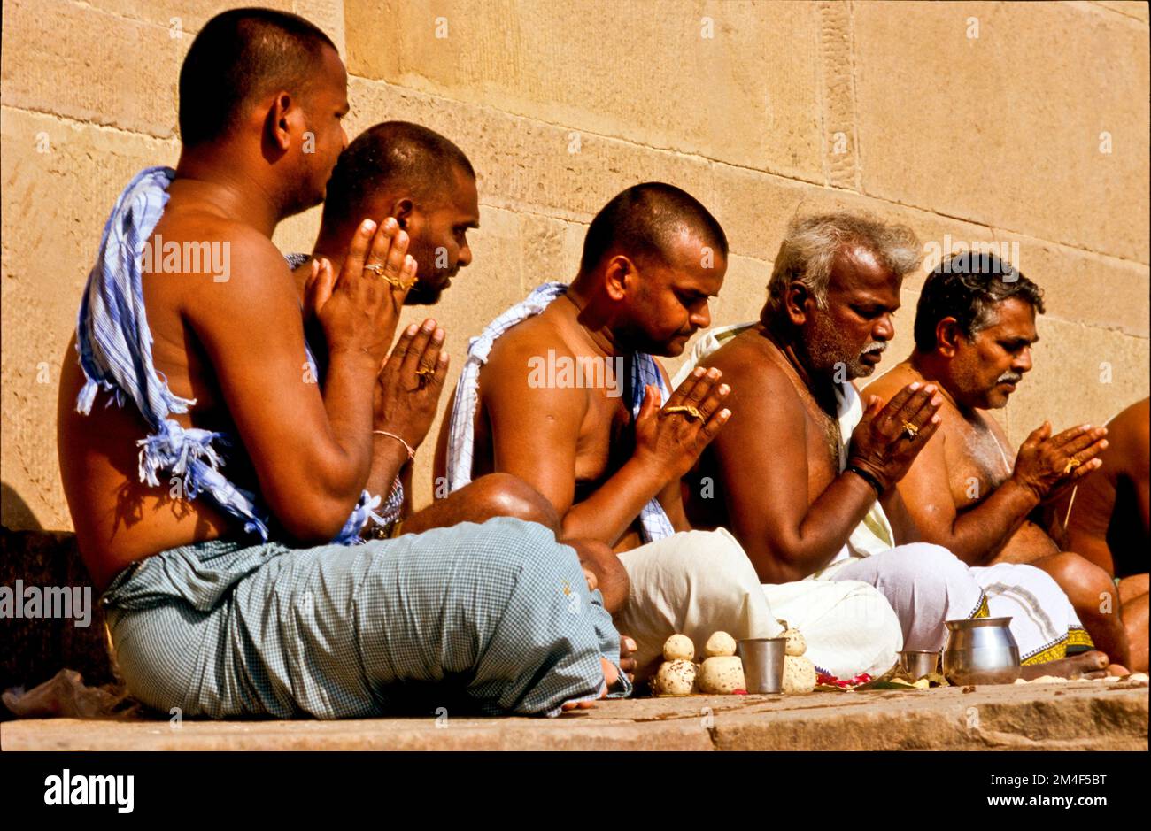 Pilgrims praying towards the holy river Ganges Stock Photo - Alamy