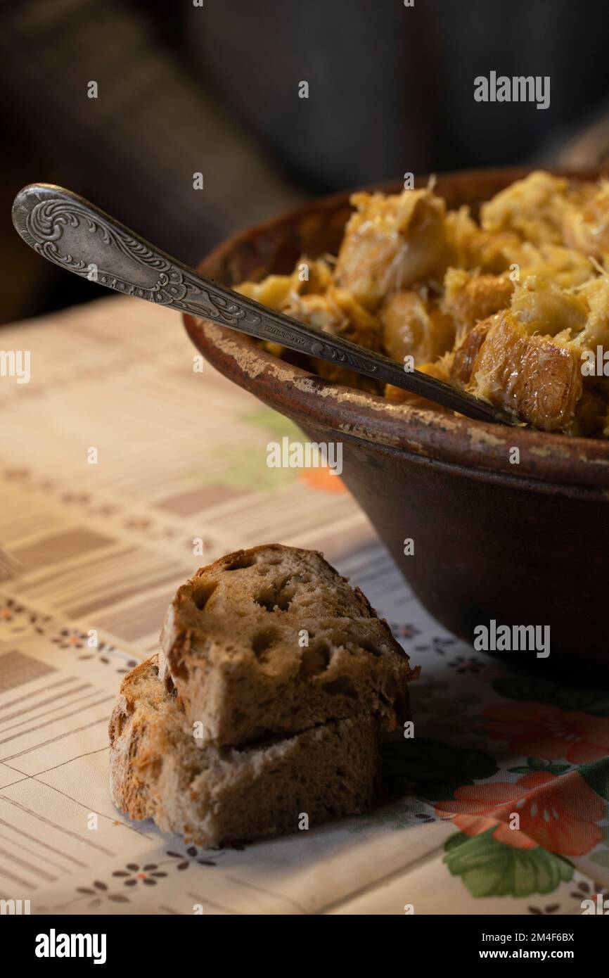 Typical portuguese dish with cod fish, olive oil and potatoes served in ...