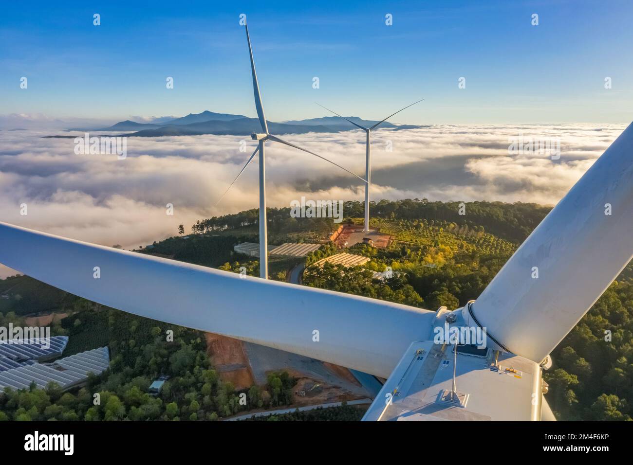 PANORAMIC VIEW OF WIND FARM OR WIND PARK, WITH HIGH WIND TURBINES FOR ...