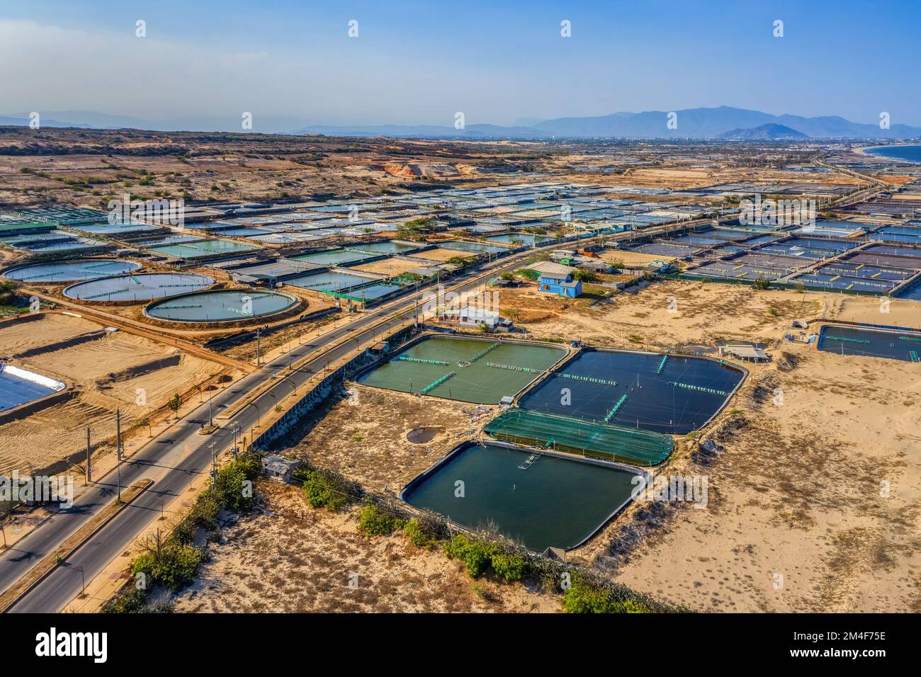 Aerial view of the prawn farm with aerator pump in front of Ninh Phuoc ...
