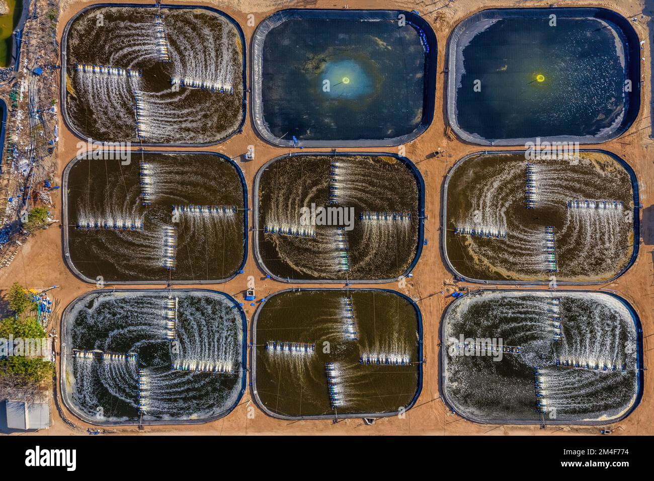 Aerial view of the prawn farm with aerator pump in front of Ninh Phuoc ...