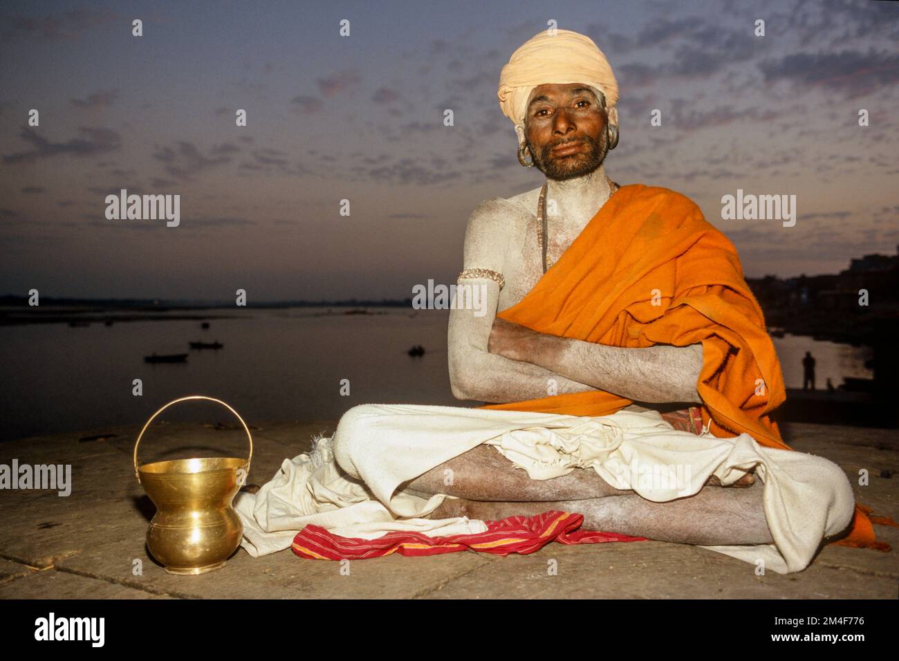 Shiva-sadhu sitting at the ghats of Varanasi Stock Photo - Alamy