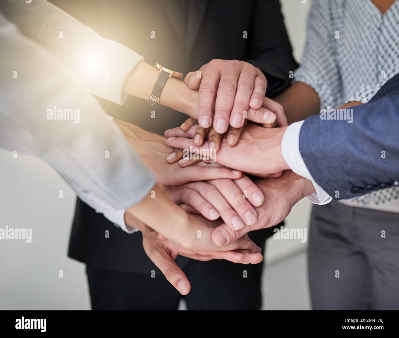 Business people joining hands hi-res stock photography and images - Alamy