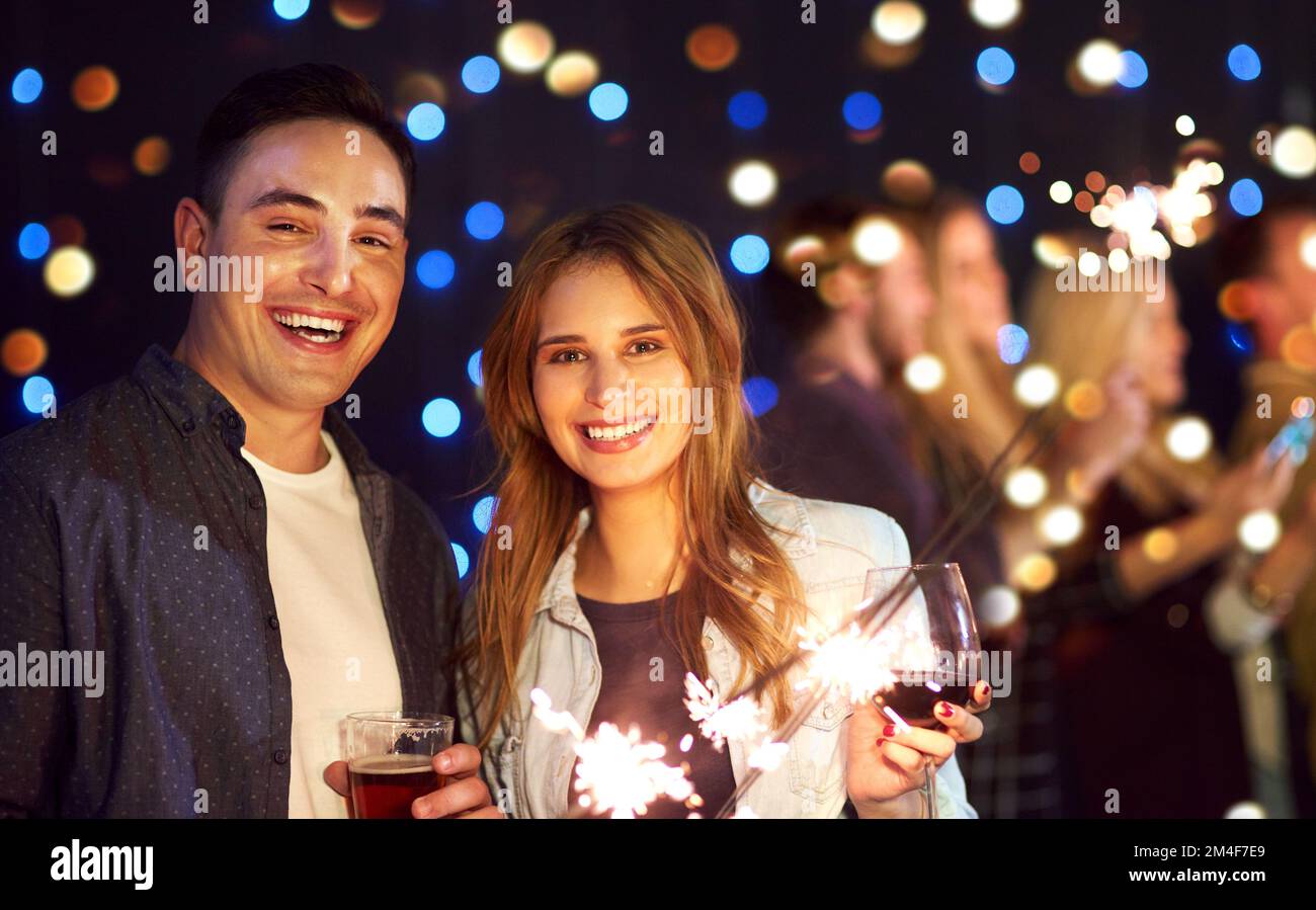 Because sparklers are great for any occasion. Portrait of an attractive ...