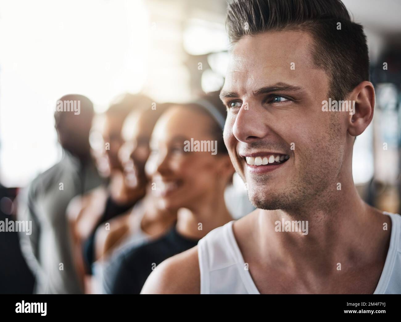 Full attendance in todays gym class. a group of young people standing ...