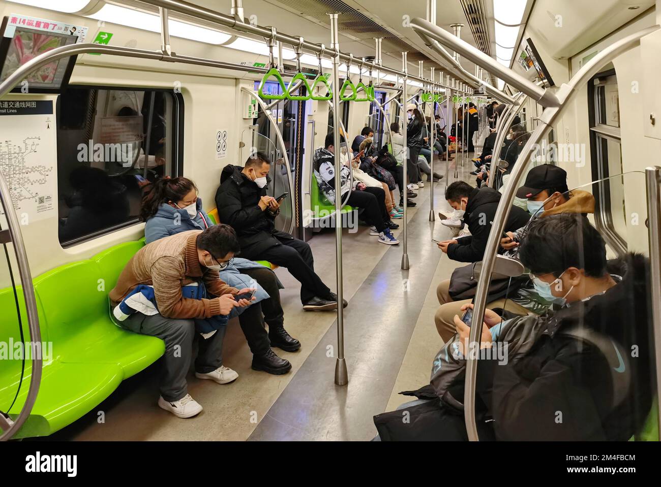 There were some vacant seats in the carriage of Beijing Subway Line 14 ...