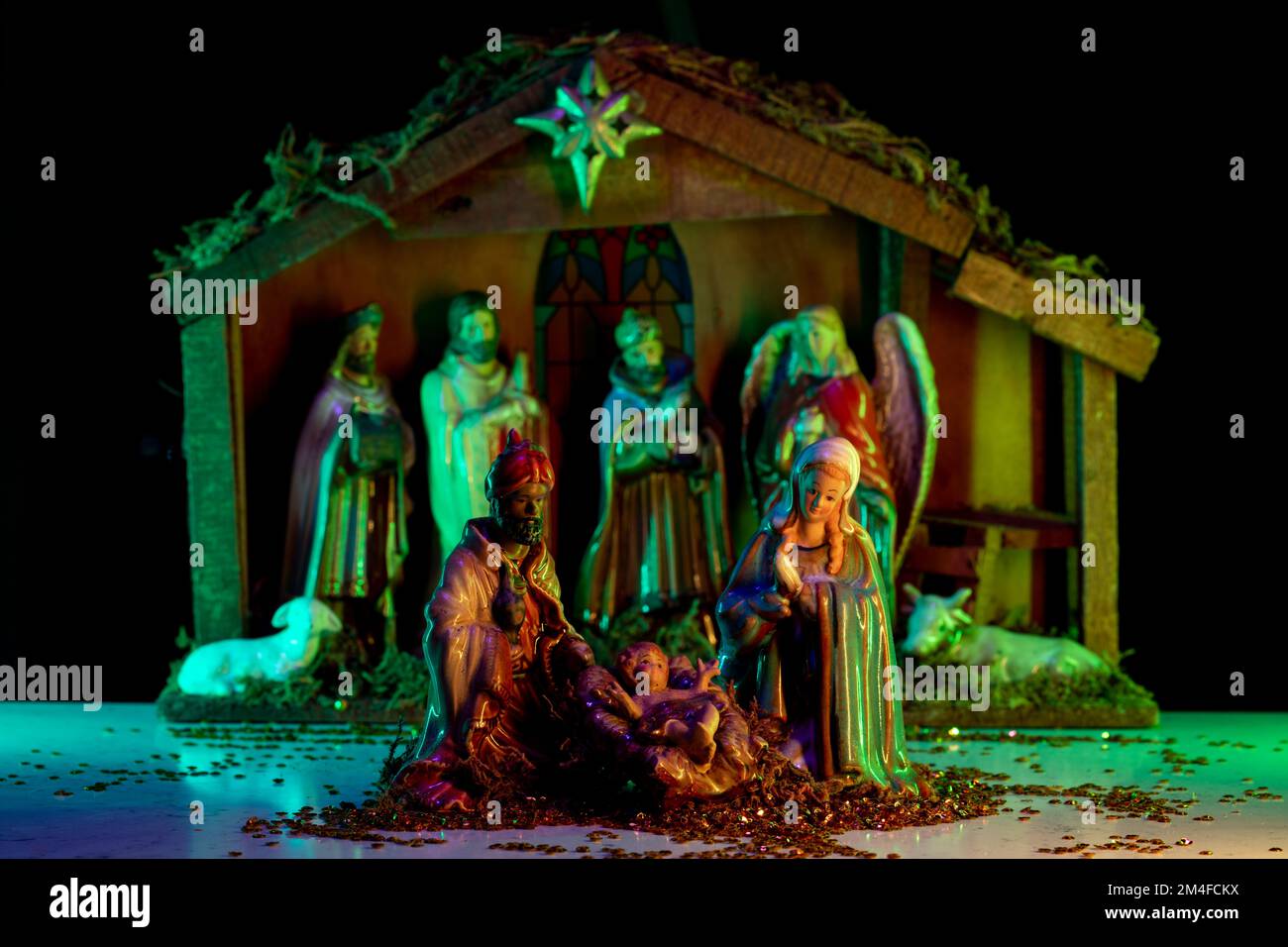 Christmas scene of born child baby Jesus Christ in the manger with ...
