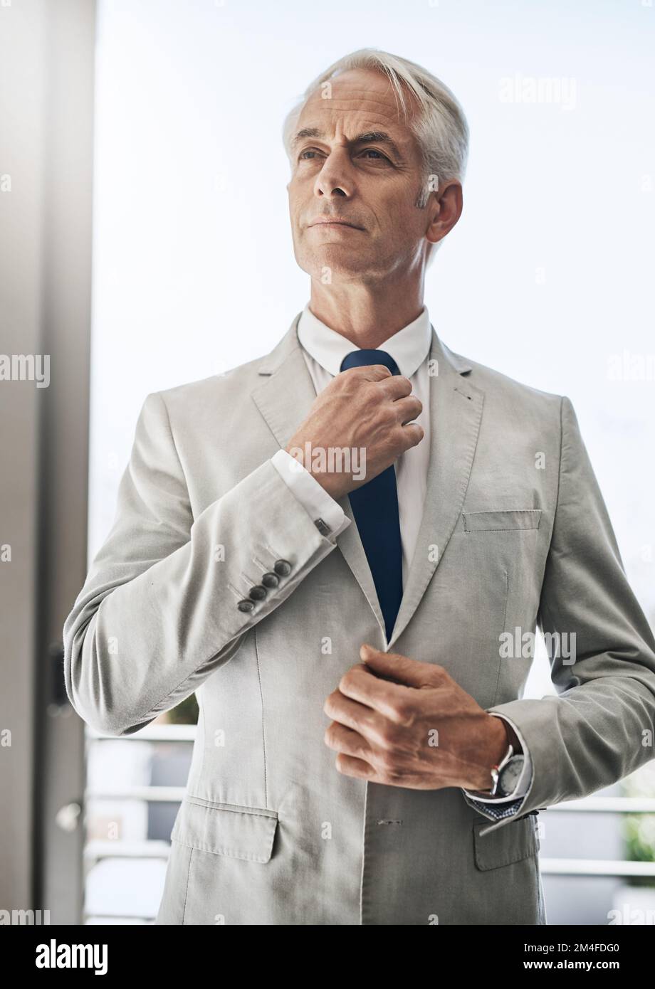 Looking sharp as always. a confident mature businessman wearing a ...