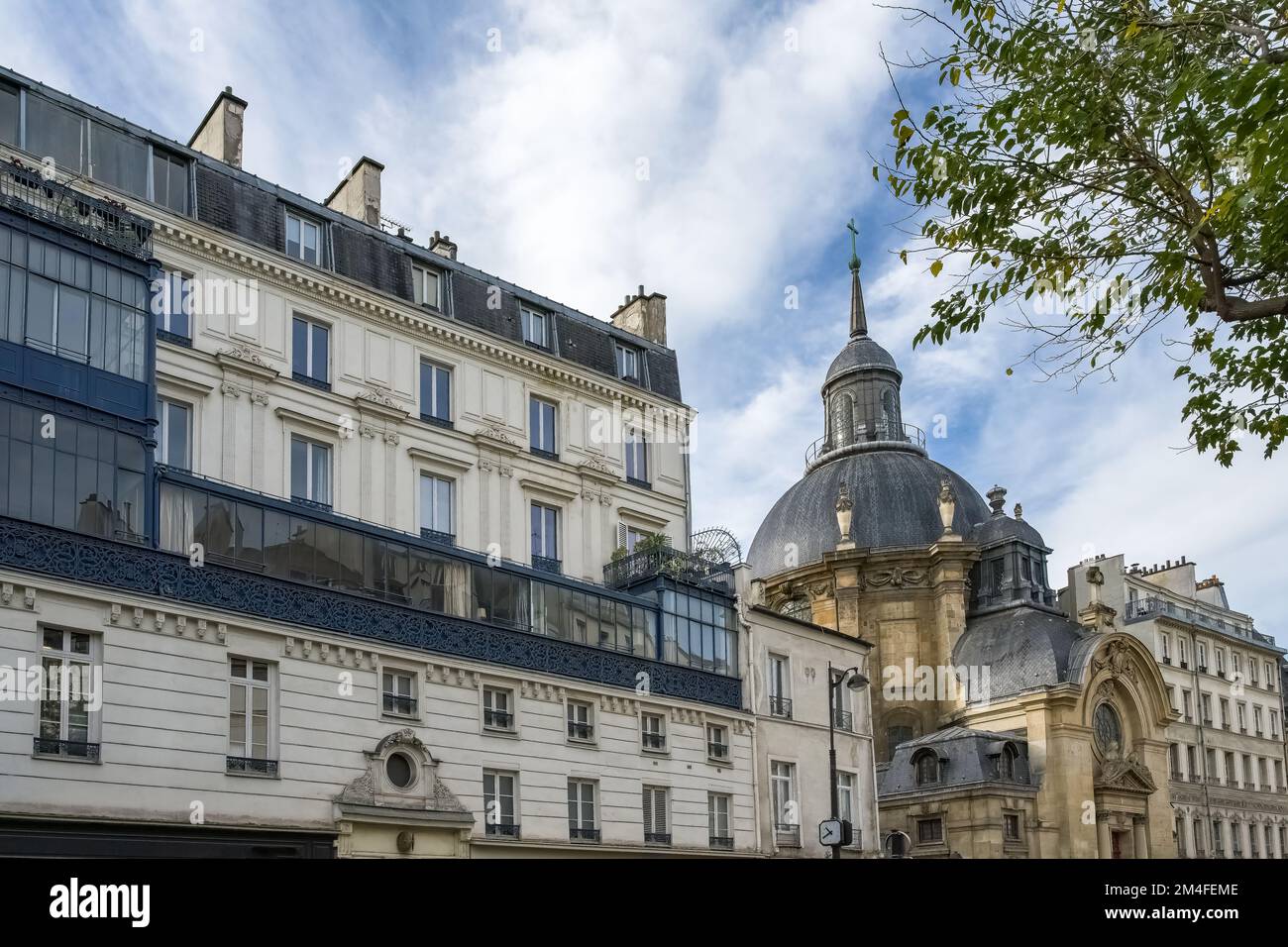 Paris, typical buildings in the Marais, rue Saint-Antoine, with the ...
