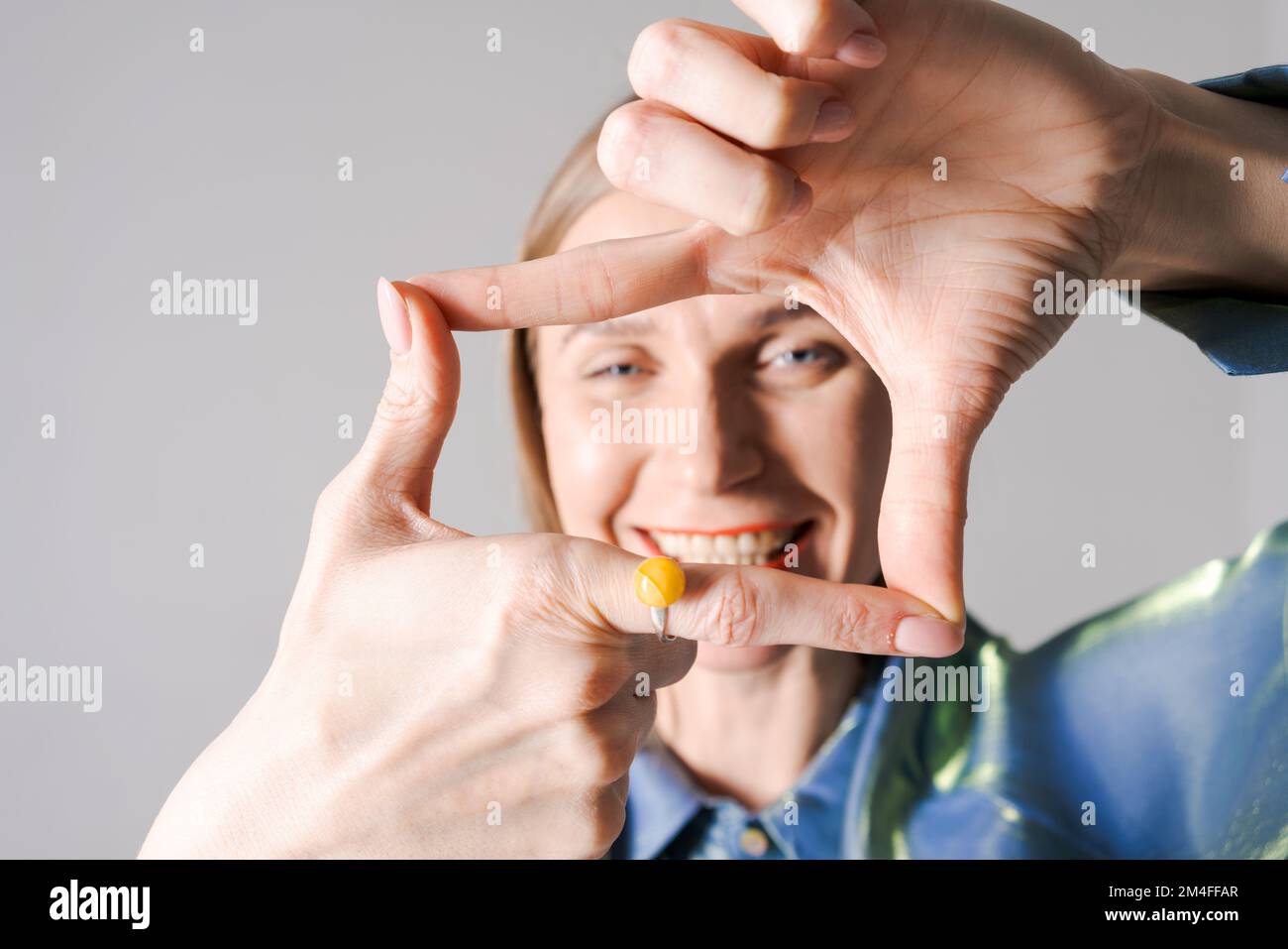 Close up portrait happy smiling woman with beaming smile framing with ...
