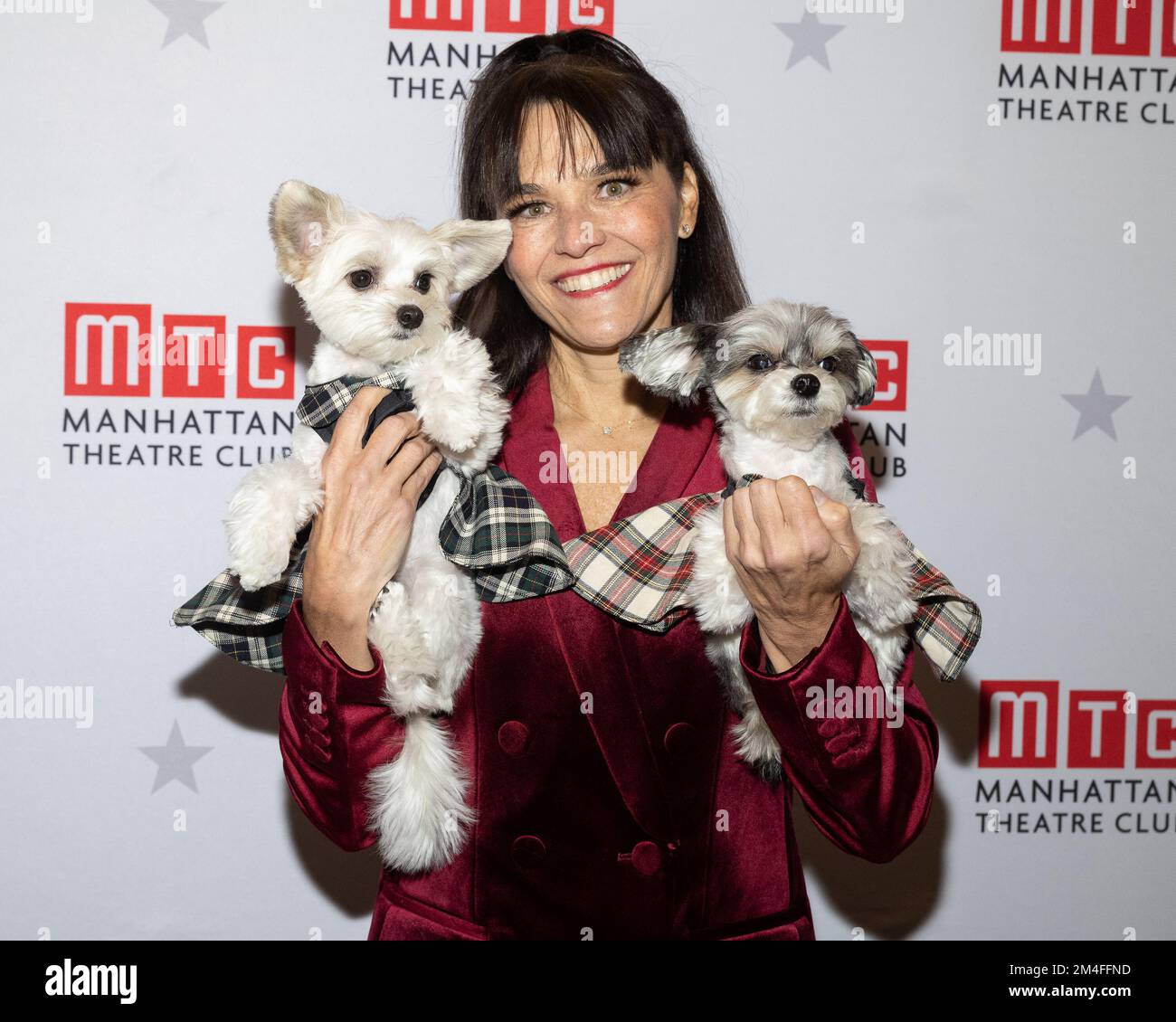 New York, USA. 20th Dec, 2022. Sam Carrell and her dogs Belle and ...