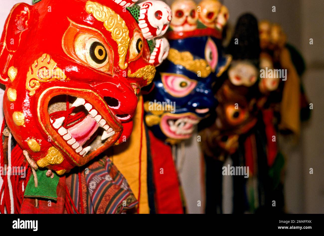 wooden masks for ritual dances in buddhist monasteries Stock Photo - Alamy