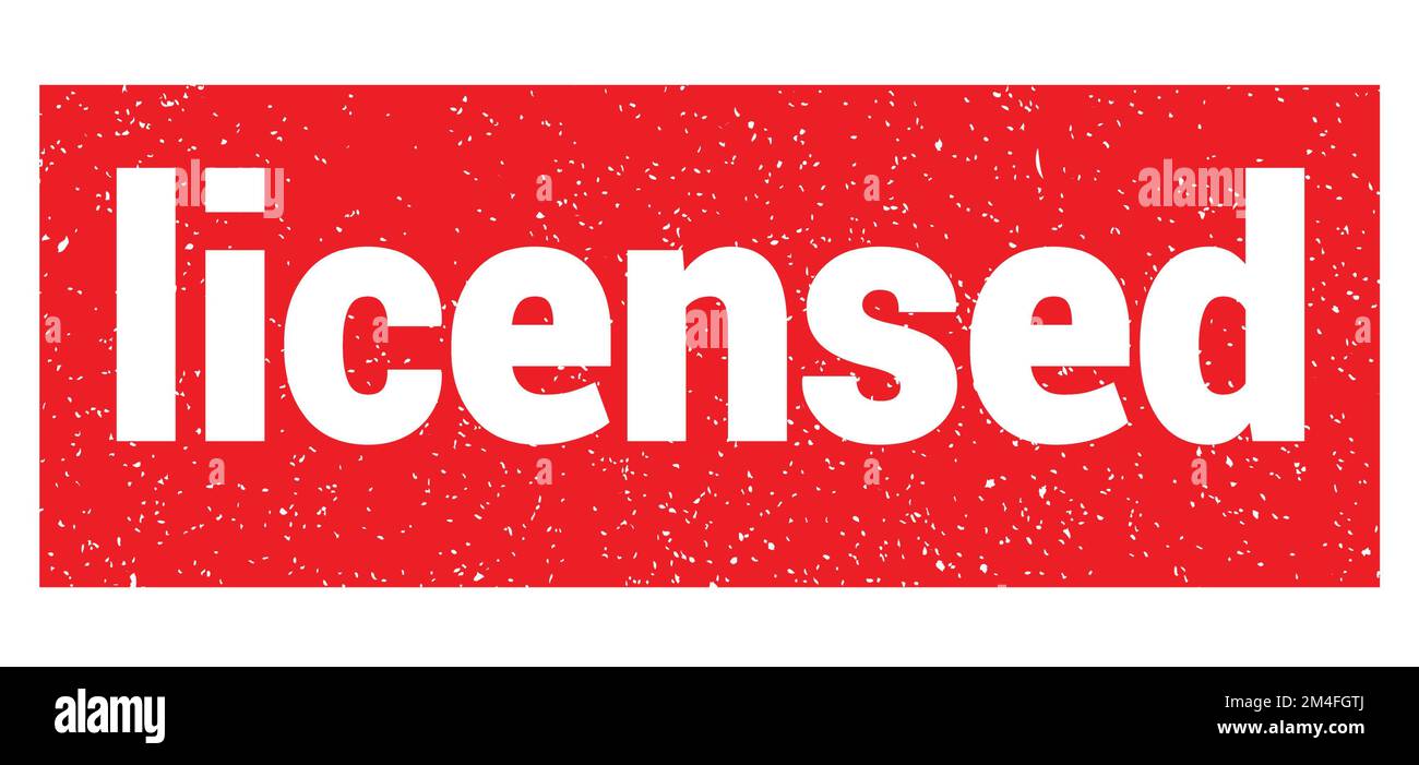 licensed text written on red grungy stamp sign Stock Photo - Alamy