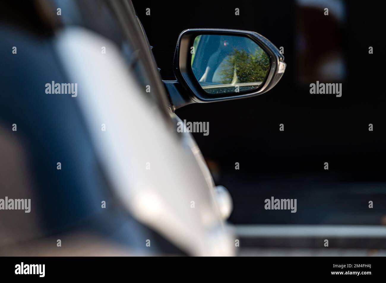 side rear view mirror on a modern car, close-up Stock Photo - Alamy
