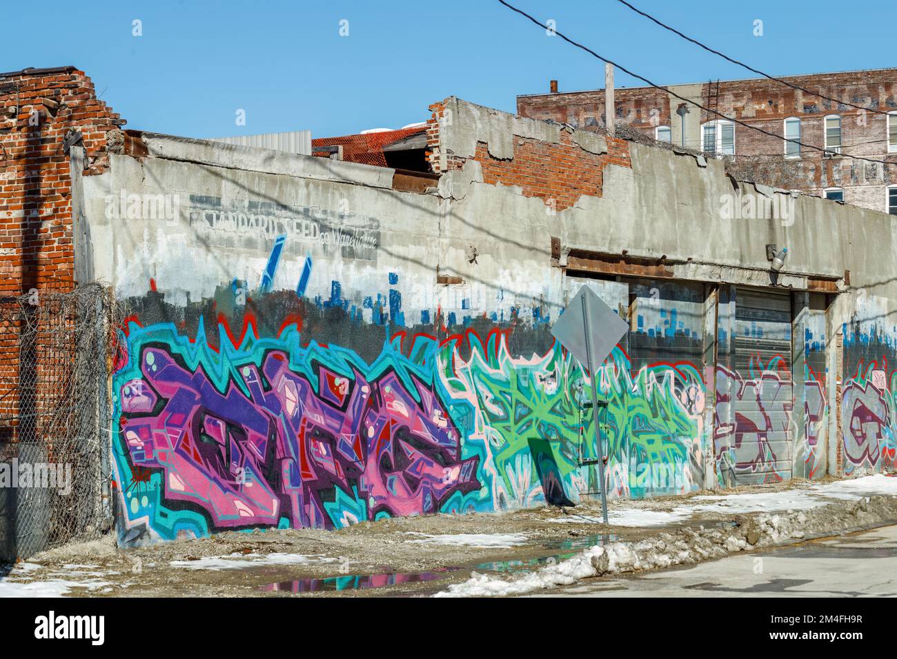 A graffiti wall on the side of an old warehouse building in Kansas City ...