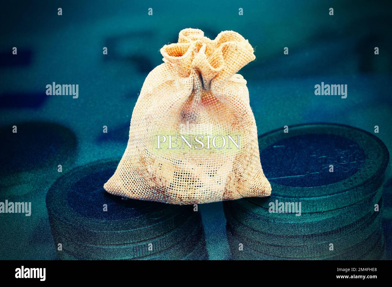 Retirement saving and pension planning money in burlap sack bag background with copy space Stock ...